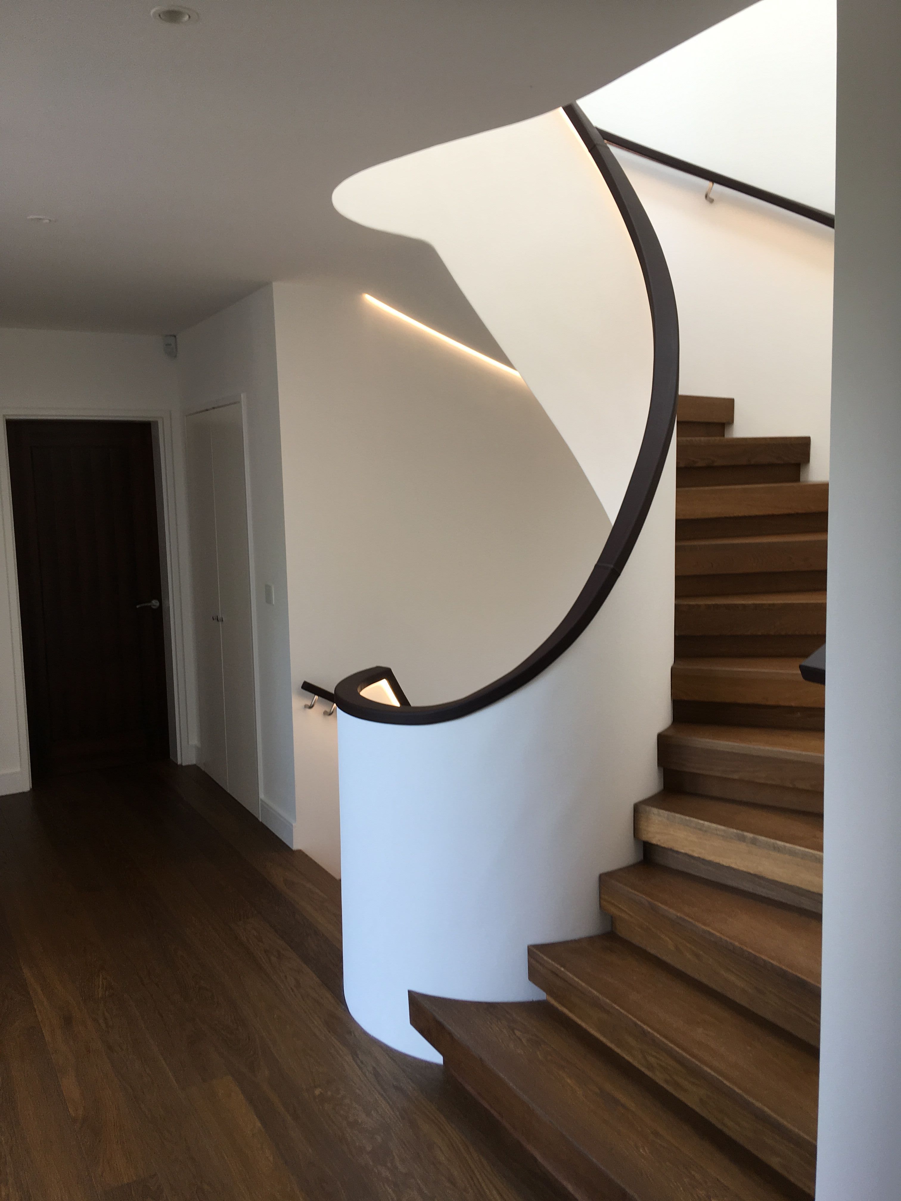 curved leather handrail - Hide and Stitch