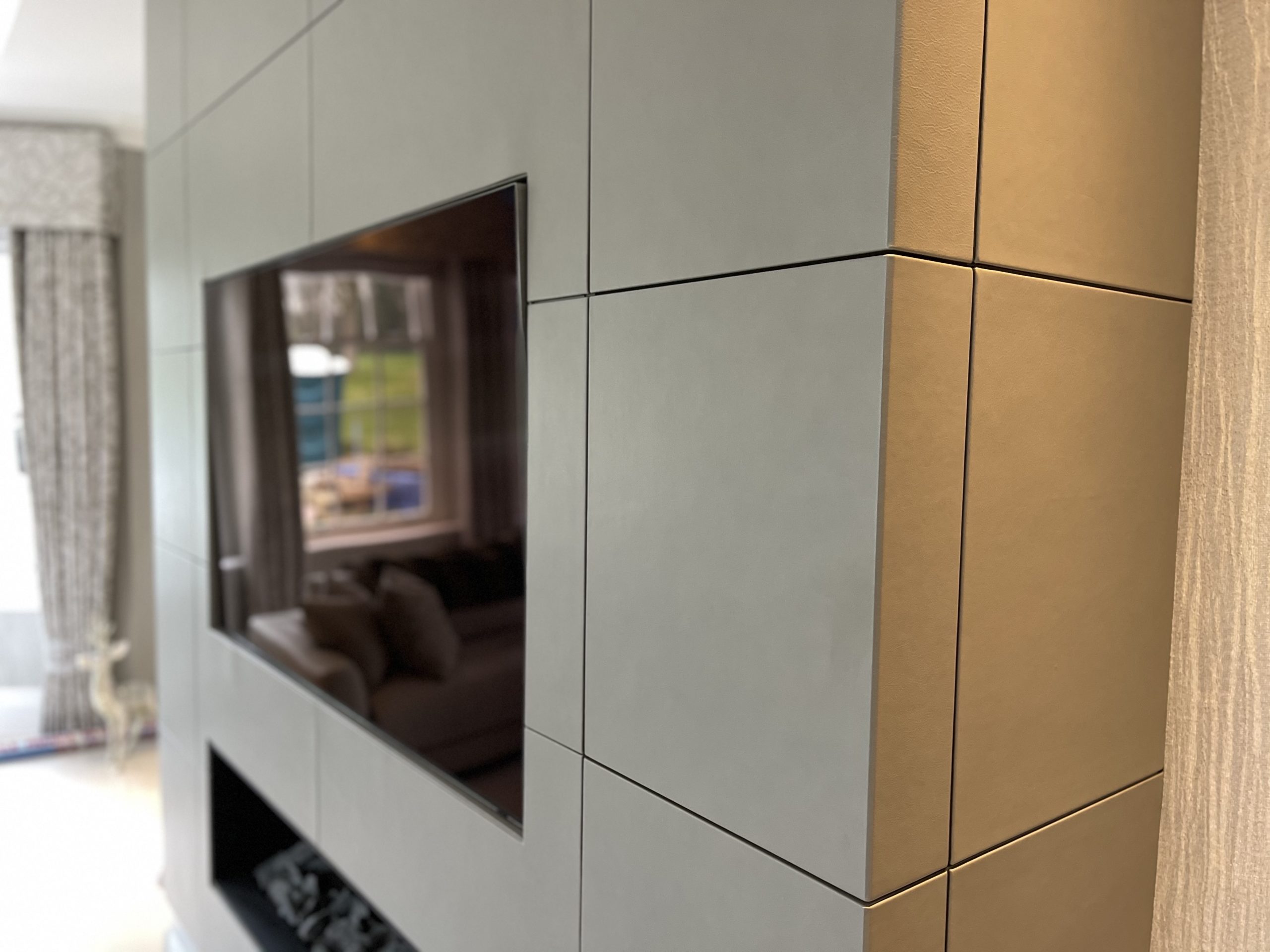 Create a Feature TV Wall in your home: Leather panels, built-in storage ...